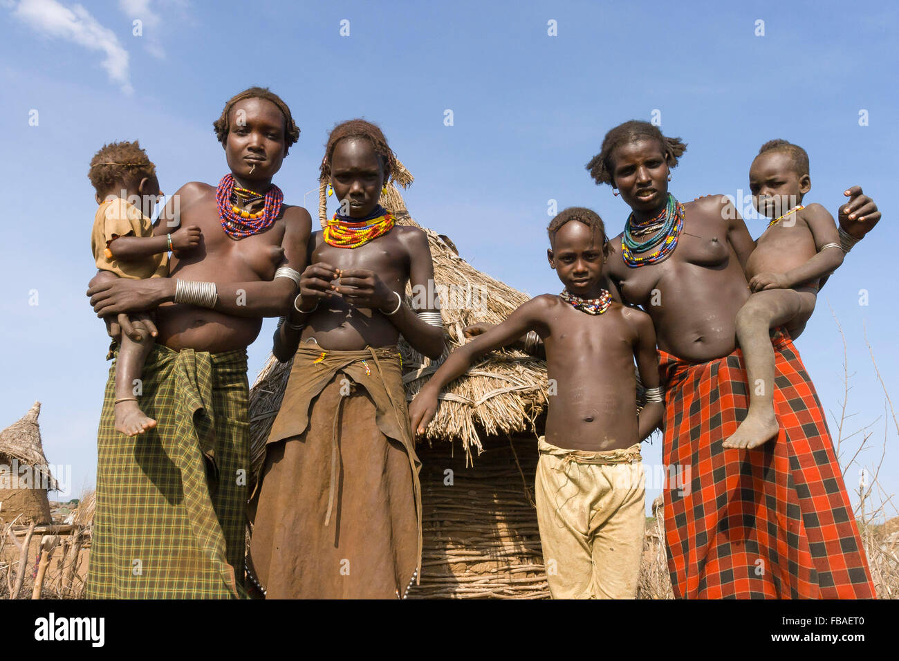 Group of young Galeb mothers and children, Omorate, Omo Valley ...