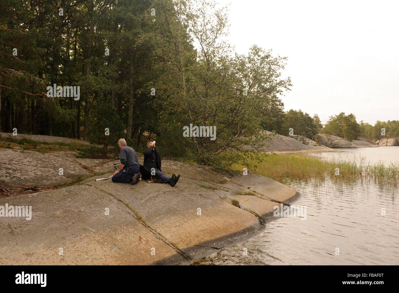 forest rangers at lunch on one of the islands of the Stockholm ...