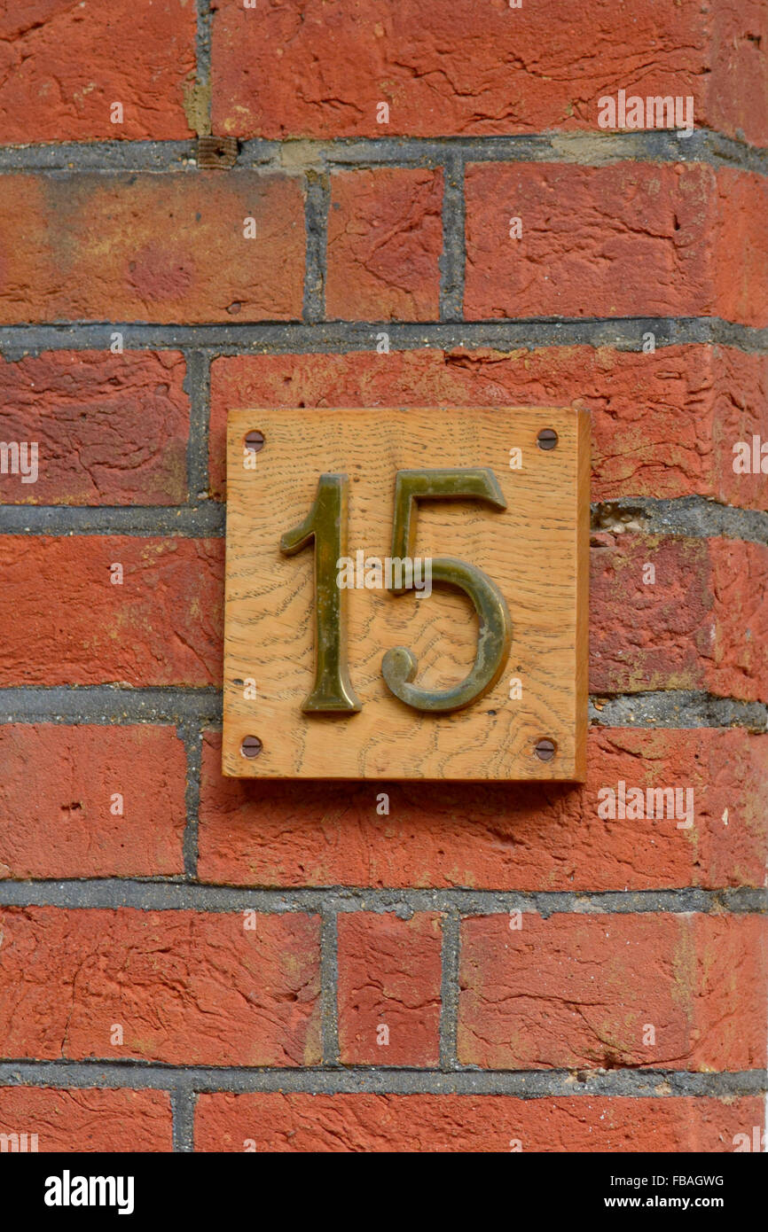 House number 15 sign on wall Stock Photo - Alamy