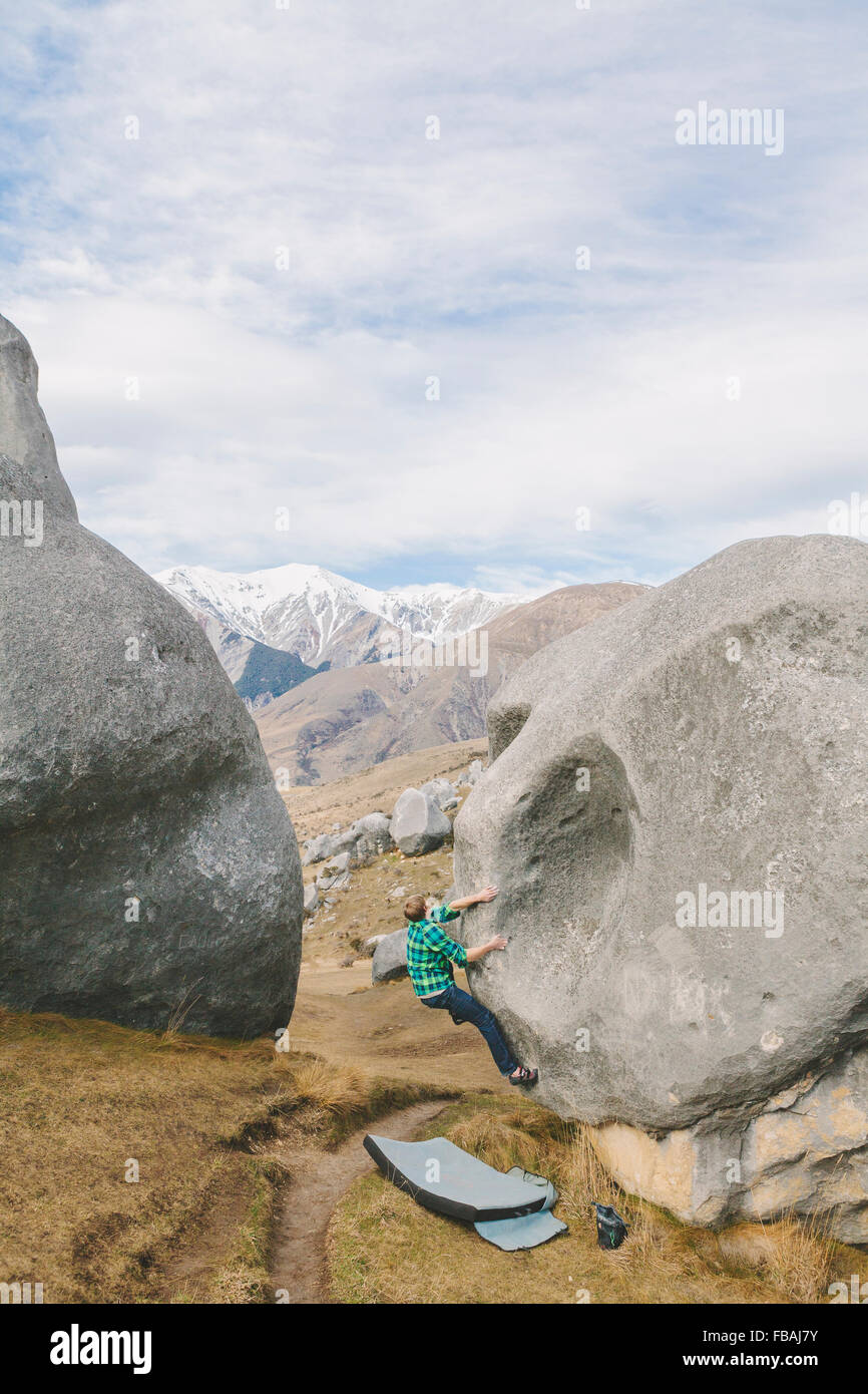 Man climbing hill hi-res stock photography and images - Alamy