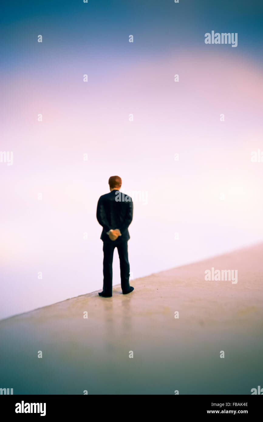 Figurine man hands behind back hi-res stock photography and images - Alamy