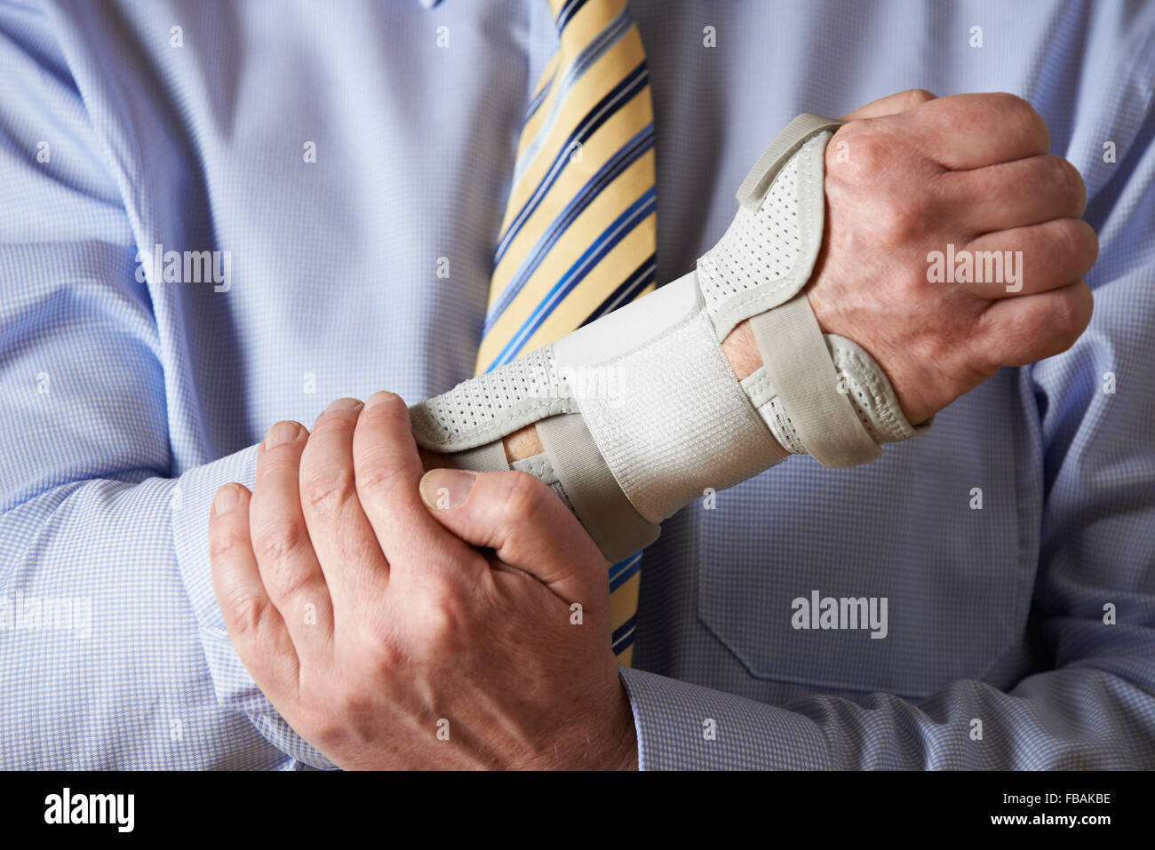 Close Up Of Businessman Suffering With Repetitive Strain Injury (RSI ...