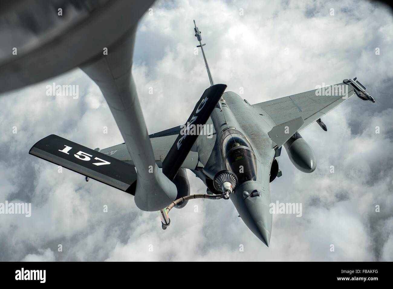 A French F-2 Rafale fighter jet is refuel by a U.S. Air Force refueling ...