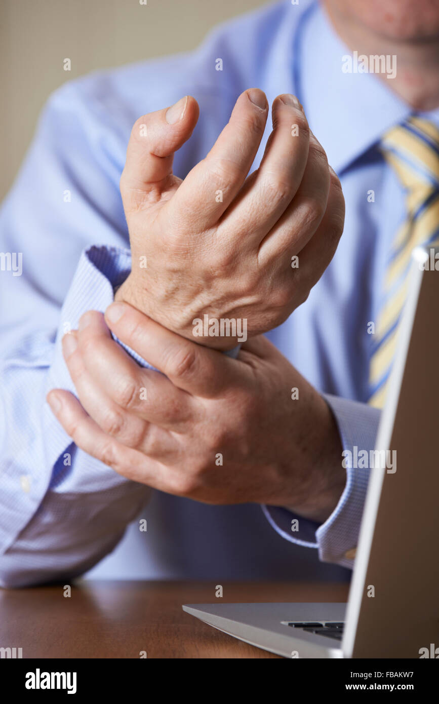 Businessman Suffering From Repetitive Strain Injury (RSI Stock Photo ...