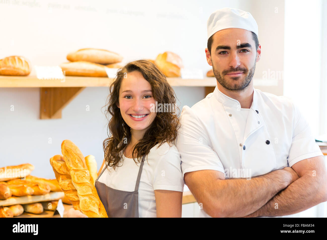 View of a Team of bakers working at the bakery Stock Photo - Alamy