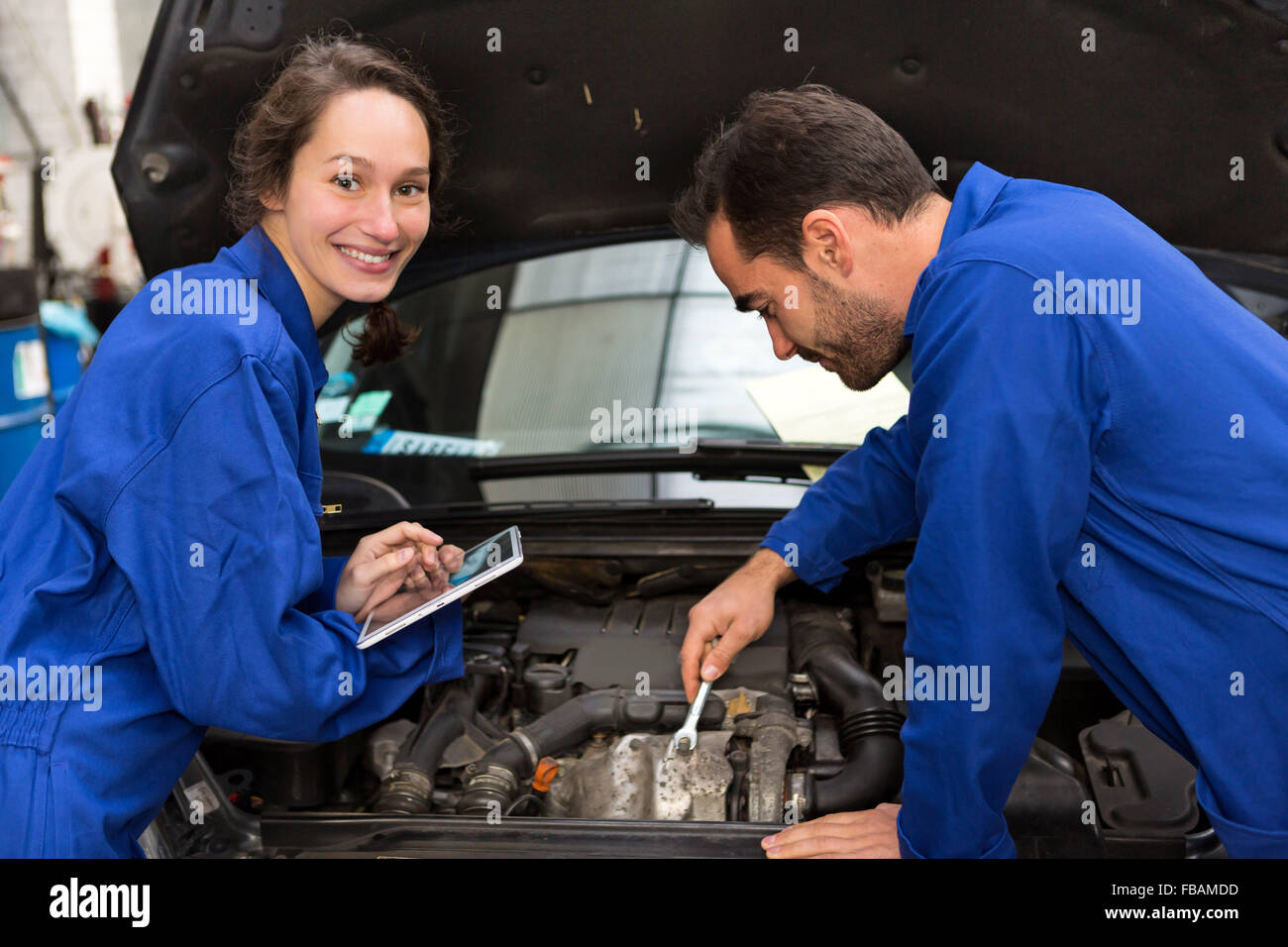 Auto mechanic working car diagnostic hi-res stock photography and ...