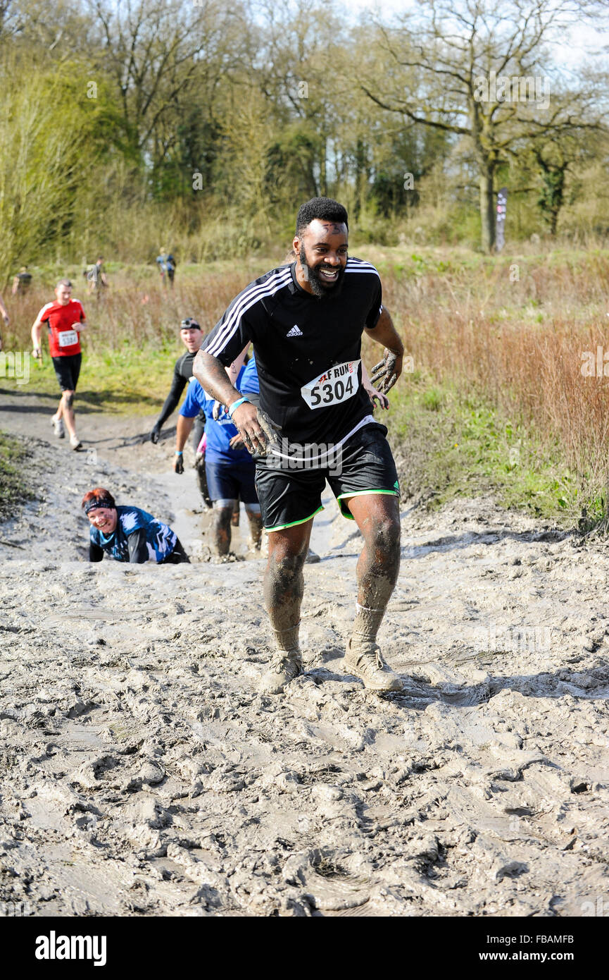 Runners at obstacle course race, UK Stock Photo - Alamy