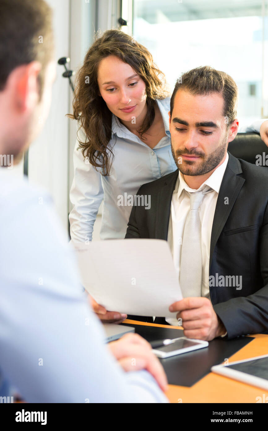VIew of a Attractive boss doing interview with his assistant Stock ...