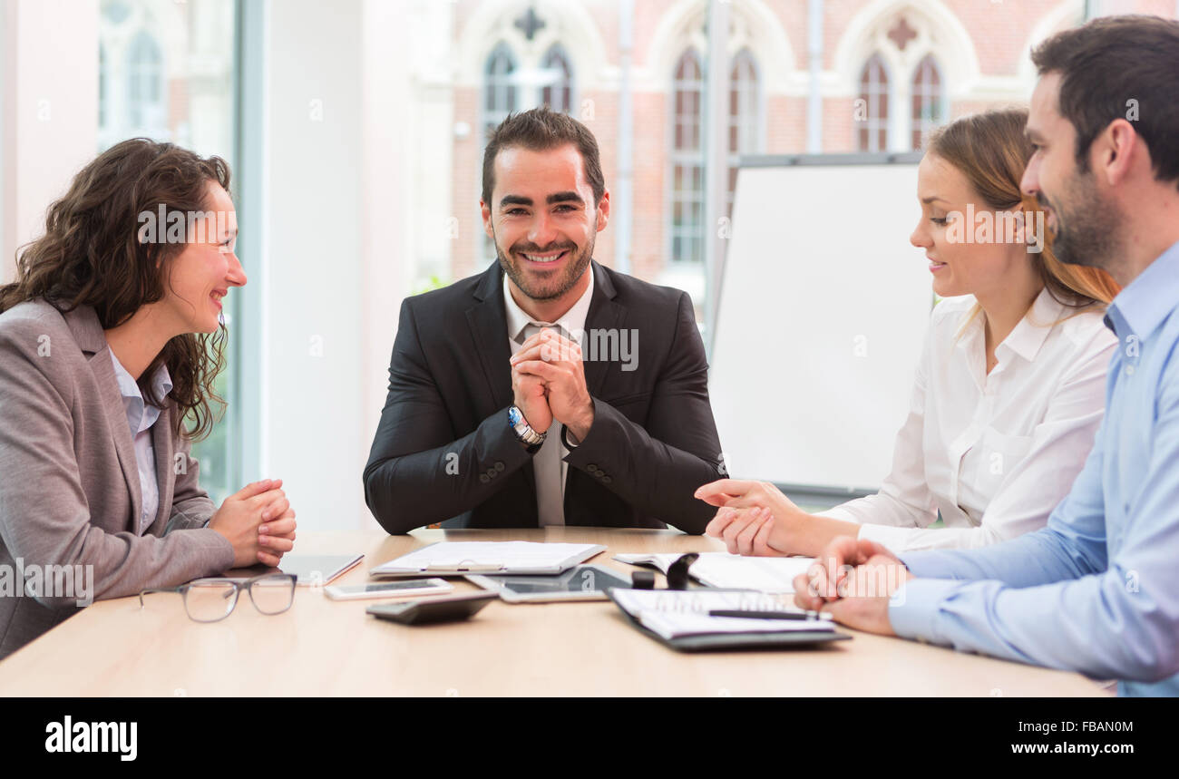 View of a Boss heading a business reunion with partners Stock Photo - Alamy