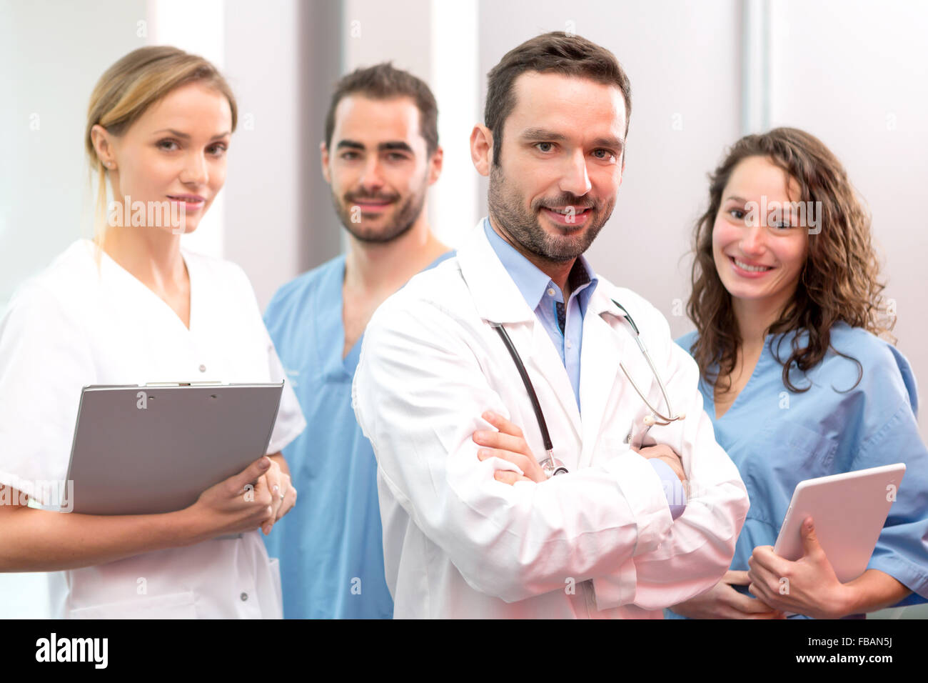 View of a Medical team working at the hospital all together Stock Photo ...