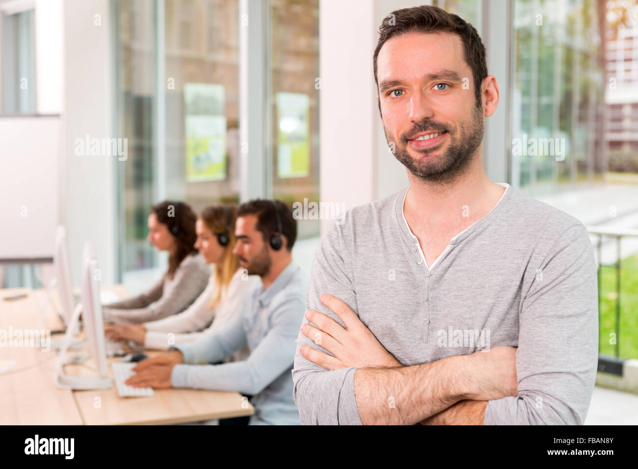 View of a young attractive man at work Stock Photo - Alamy