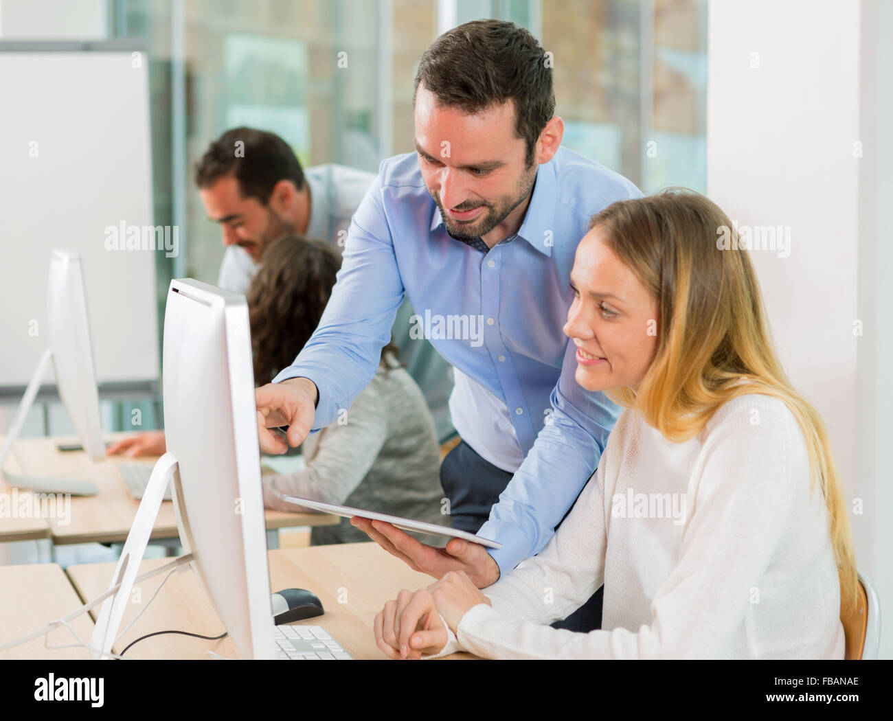 View of a Young attractive people taking a training course with ...