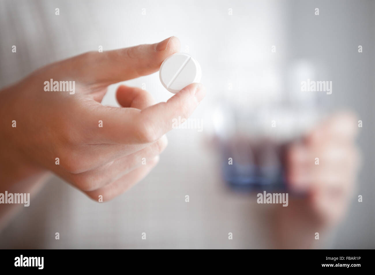 Healthcare, treatment, supplements. Female patient arms holding one ...