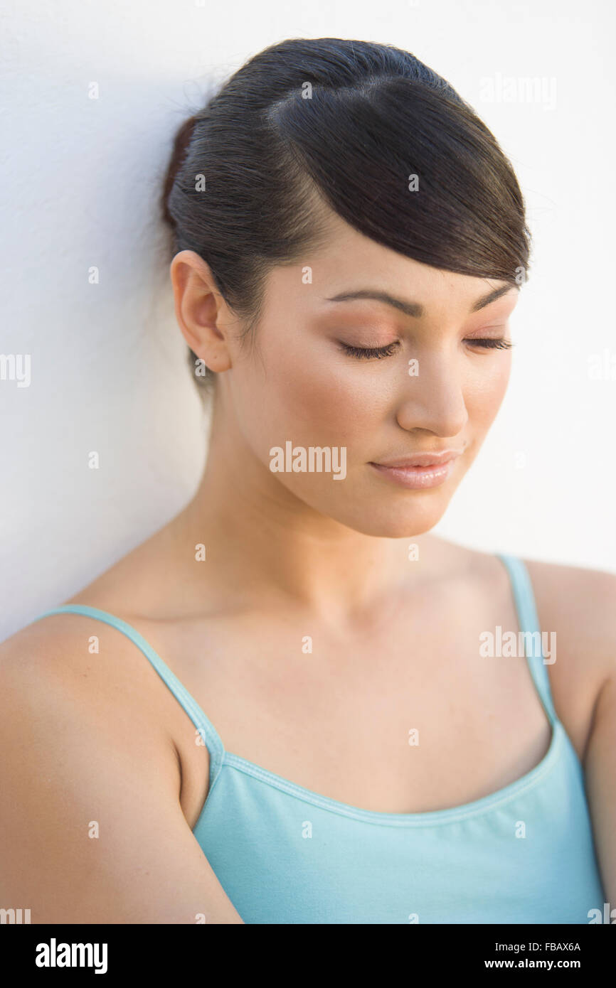 Portrait of a dark-haired young woman Stock Photo - Alamy
