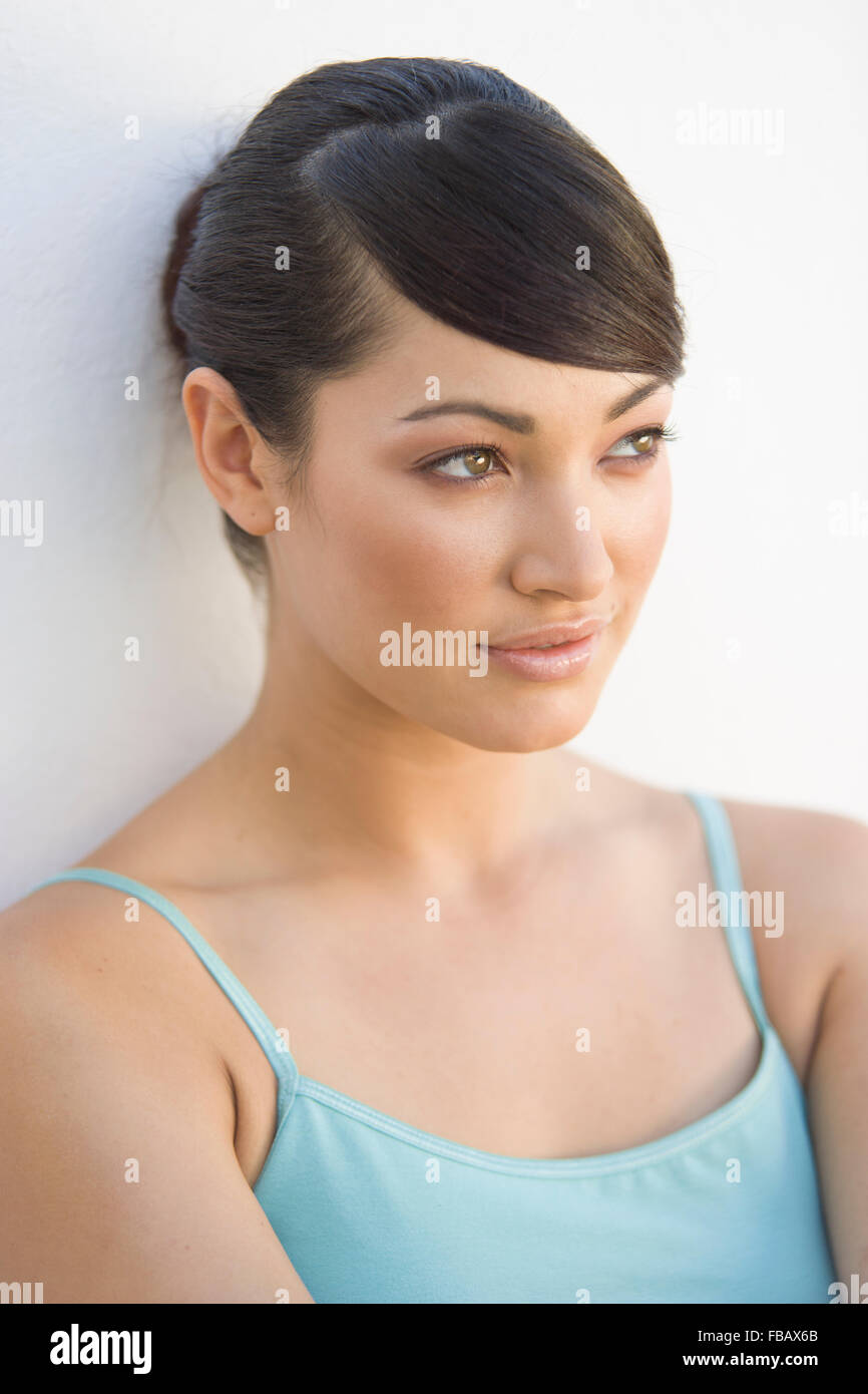 Portrait of a dark-haired young woman Stock Photo - Alamy