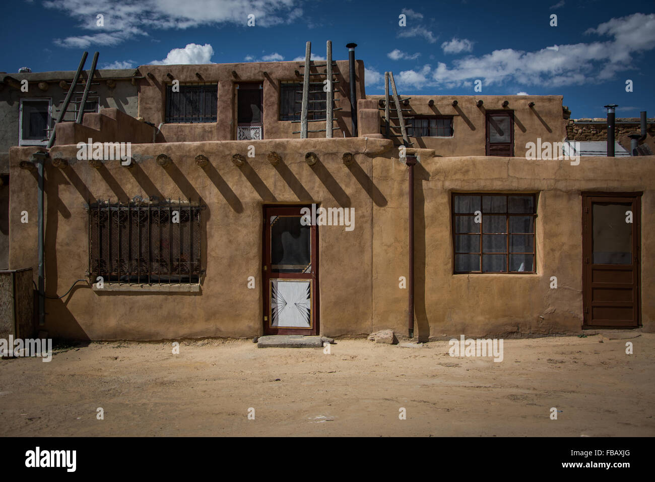 Pueblo houses ladders hi-res stock photography and images - Alamy