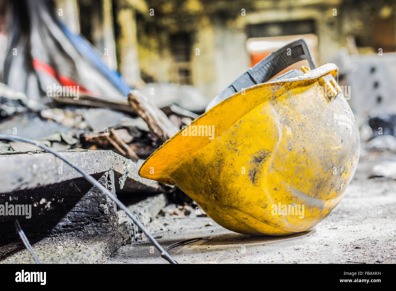 Discarded Hard Hat in abandoned factory Stock Photo - Alamy