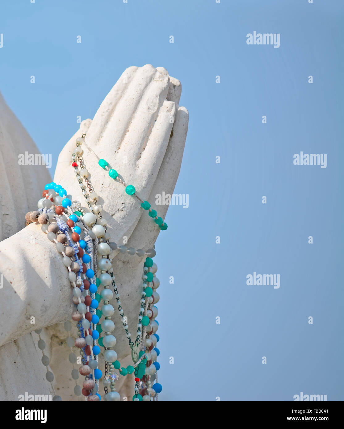 Praying hands joint hi-res stock photography and images - Alamy