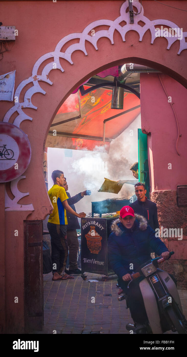 Moroccan alley and street food Stock Photo - Alamy