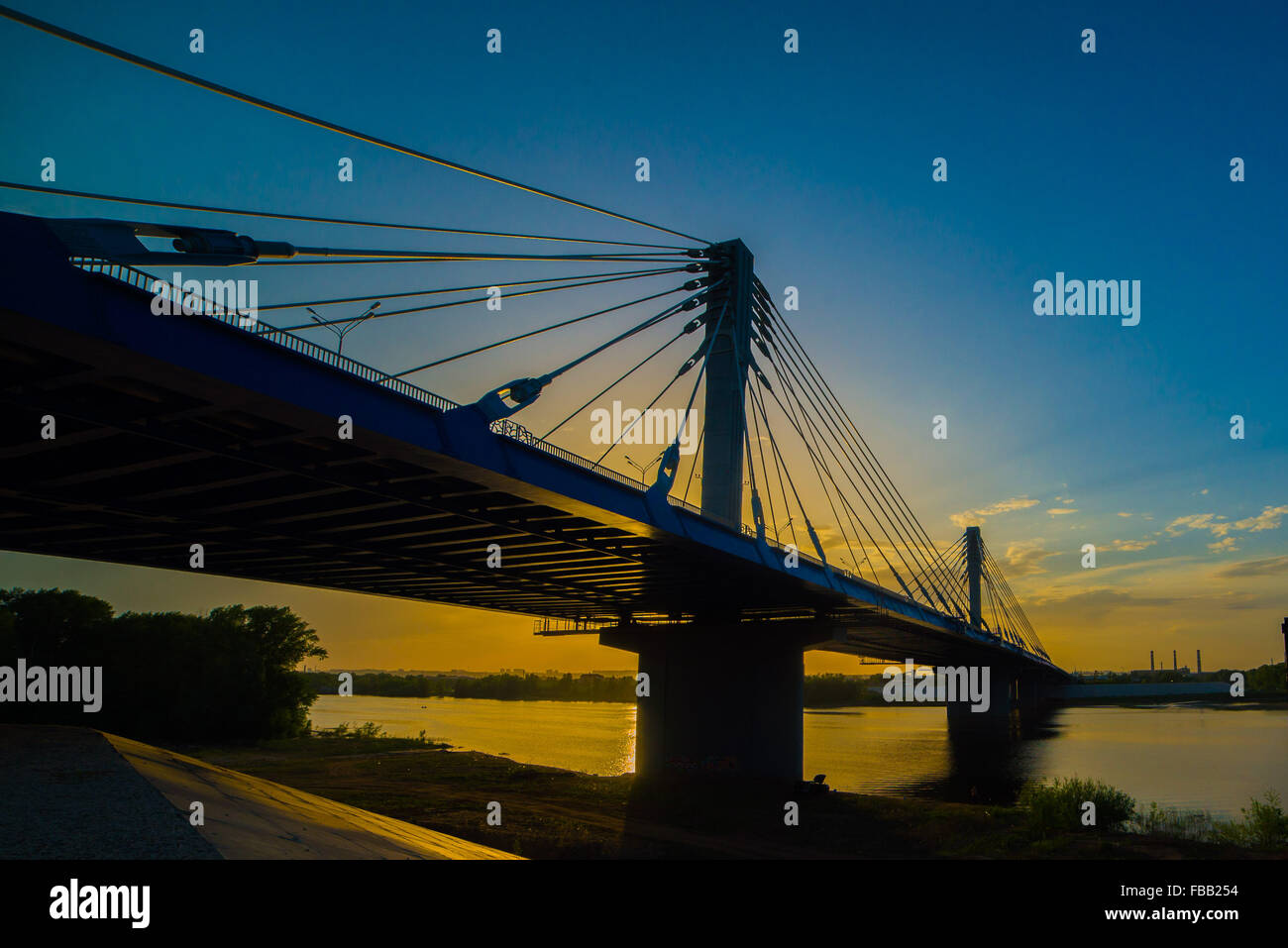 Summer bridge snow Stock Photo - Alamy