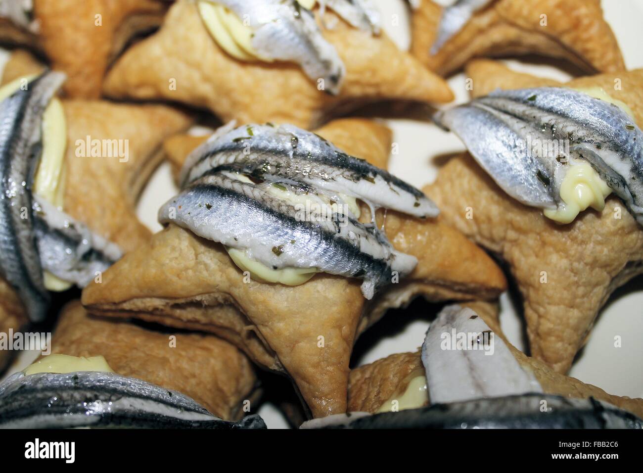 canape of puff pastry with anchovy fillet and mayonnaise Stock Photo ...