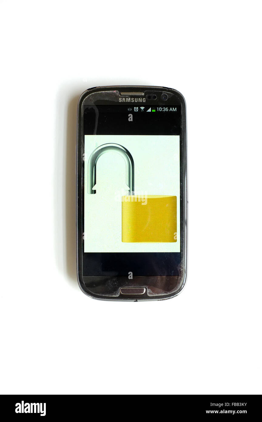 An image of an unlocked padlock on a smartphone screen photographed ...