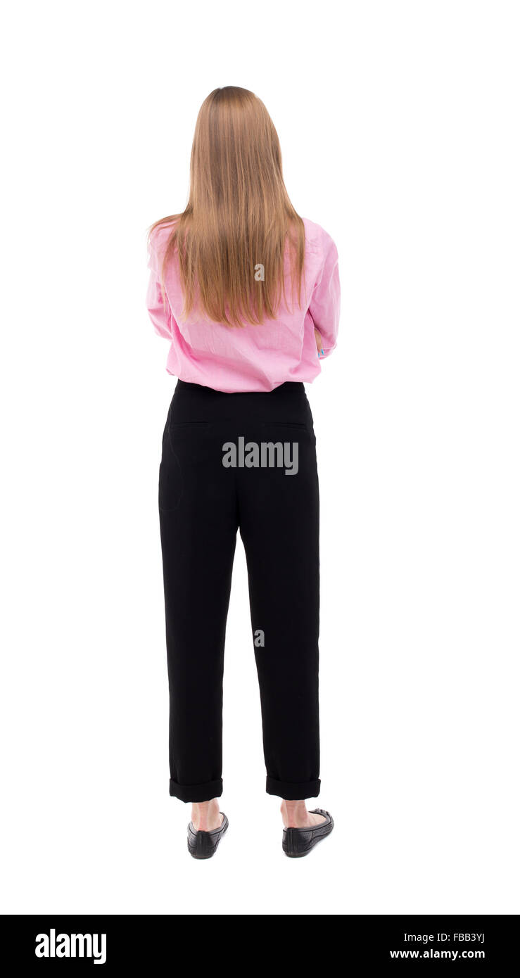 back view of standing young beautiful woman. girl watching. Rear view ...