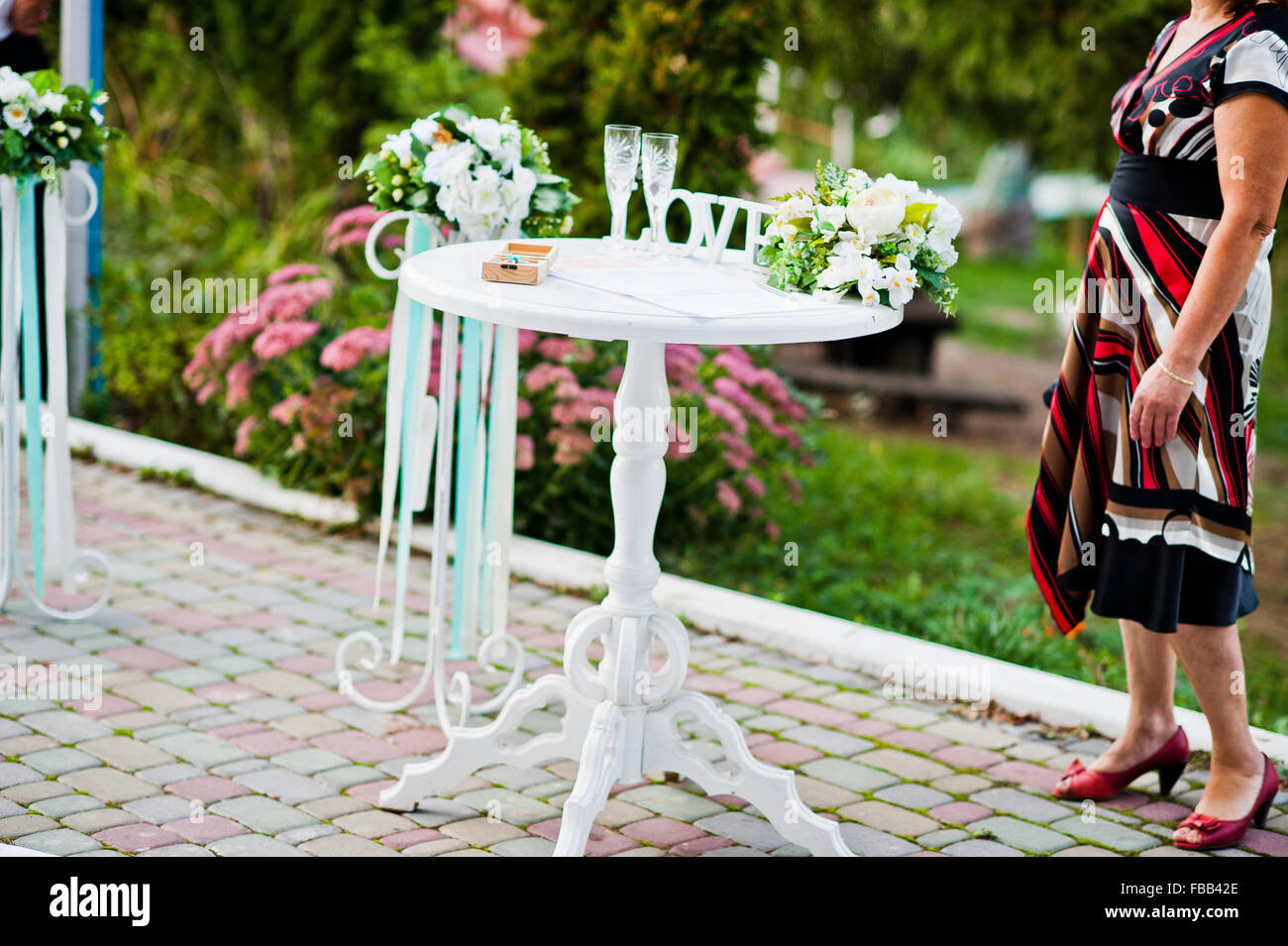Small wedding table on wedding ceremony Stock Photo - Alamy