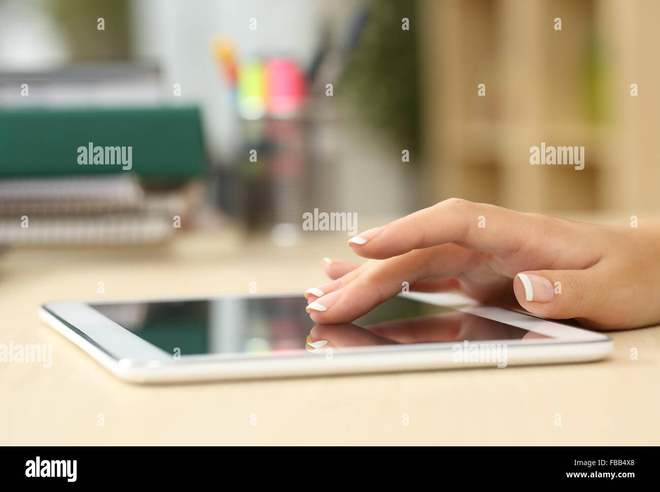Female student hand up desk hi-res stock photography and images - Alamy
