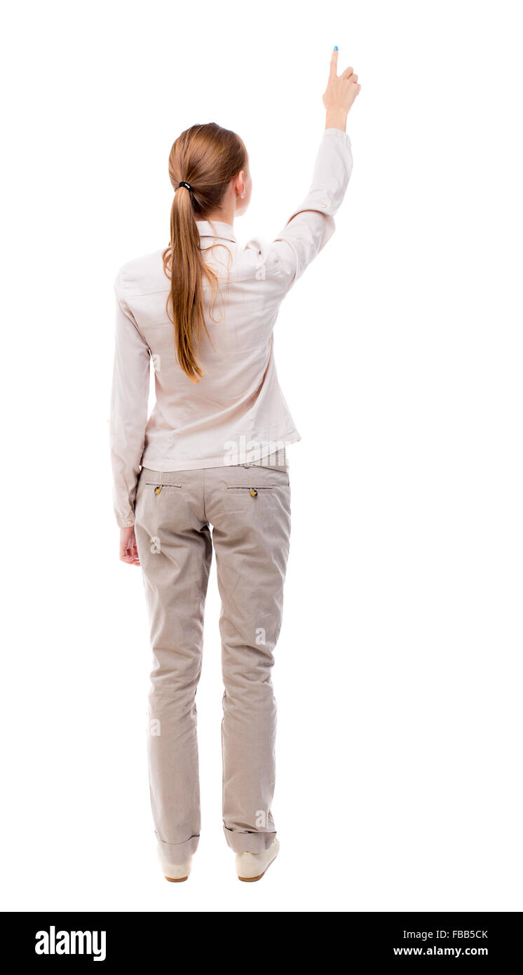 Back view of pointing woman. beautiful girl. Rear view people ...