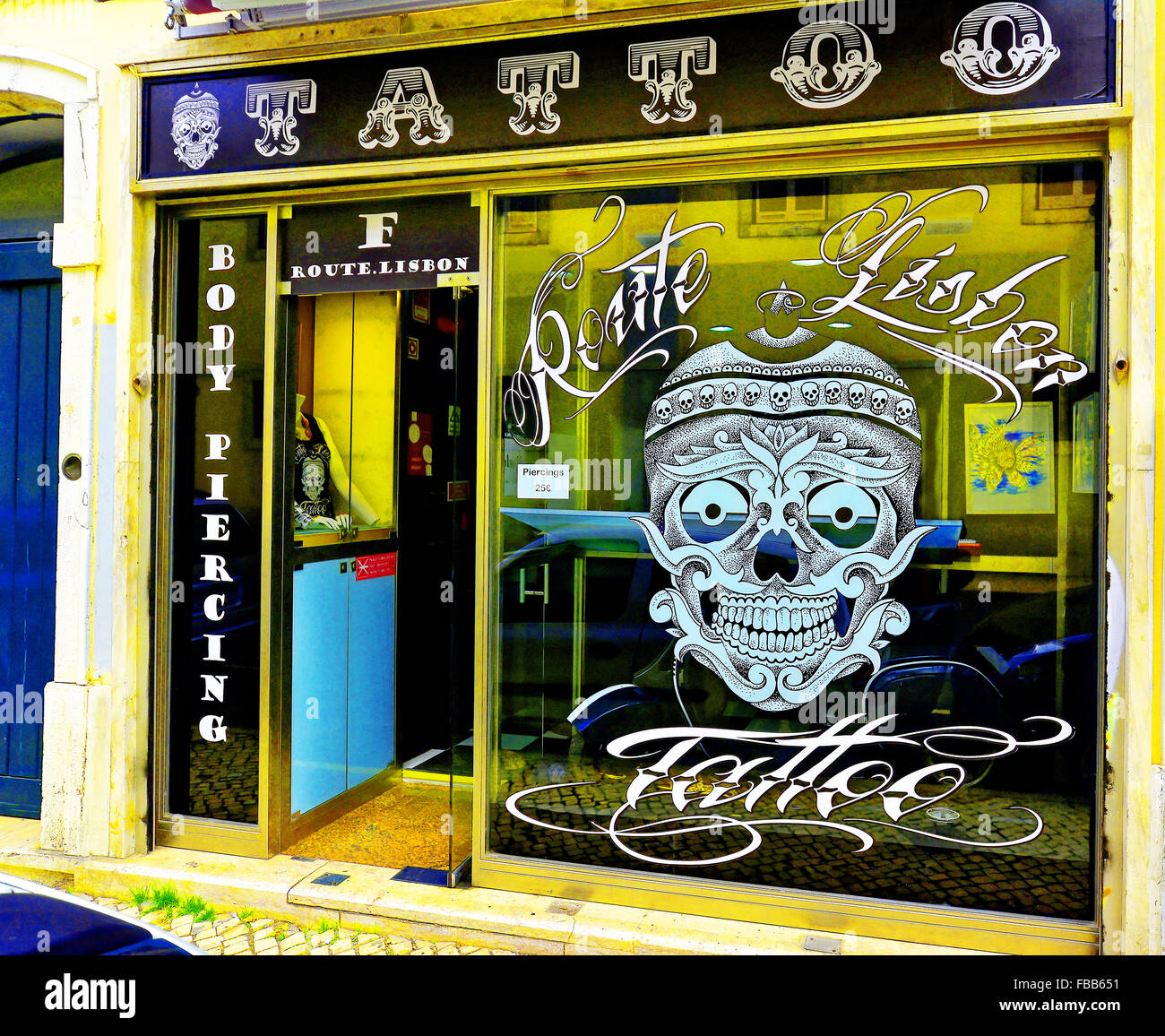 Portugal Lisbon skull decorated Tattoo shop Stock Photo - Alamy