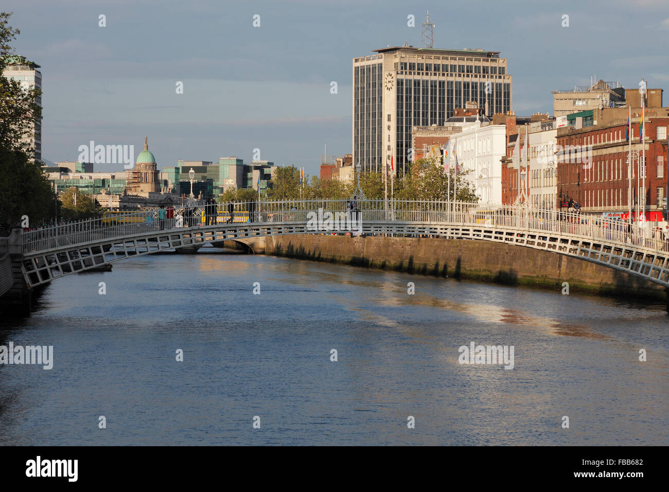 Half Penny Bridge over the Liffey river in Dublin, Ireland Stock Photo ...