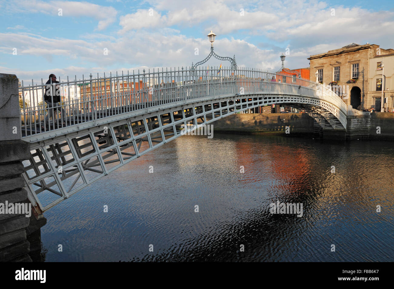 Half Penny Bridge over the Liffey river in Dublin, Ireland Stock Photo ...