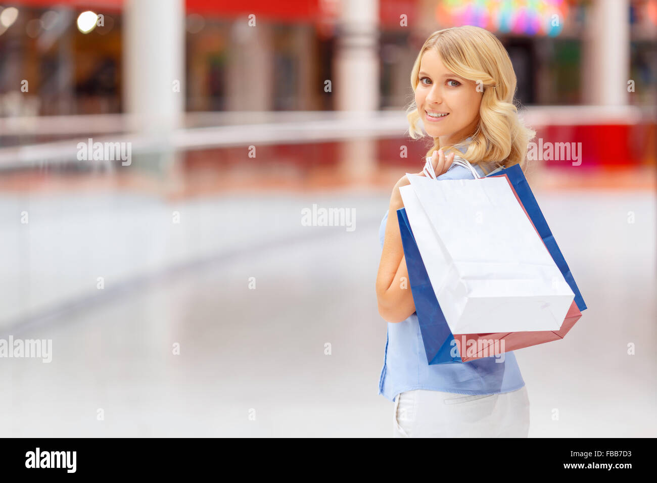Charming girl shopping Stock Photo - Alamy