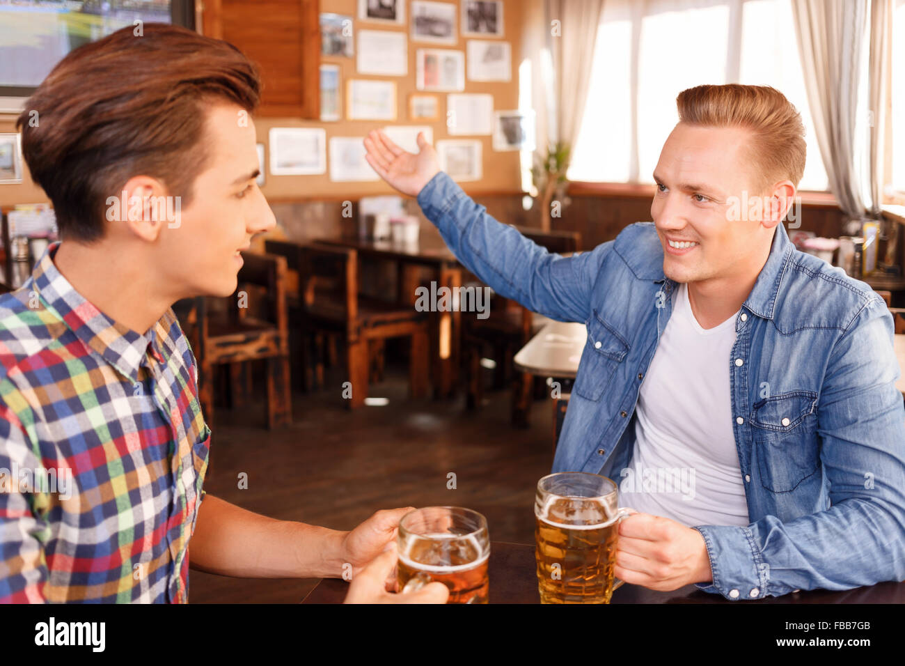 Happy friend celebrating the victory Stock Photo - Alamy