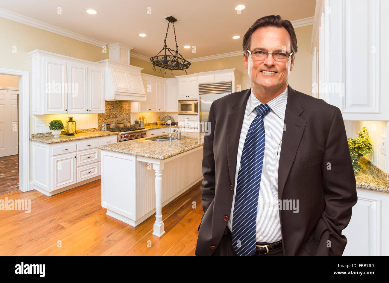 Handsome Man Wearing Suit and Tie in Beautiful Custom Residential ...
