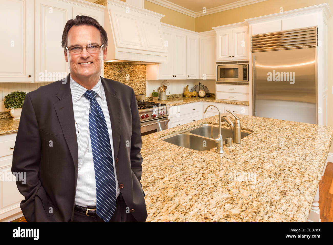 Handsome Man Wearing Suit and Tie in Beautiful Custom Residential ...