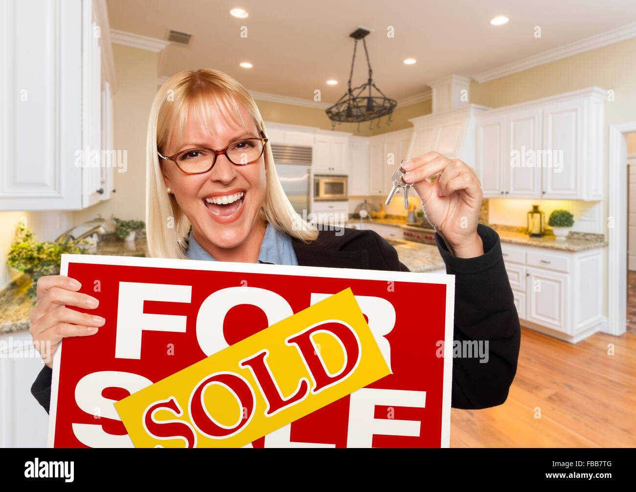 Happy Young Woman Holding Sold For Sale Real Estate Sign and Keys ...