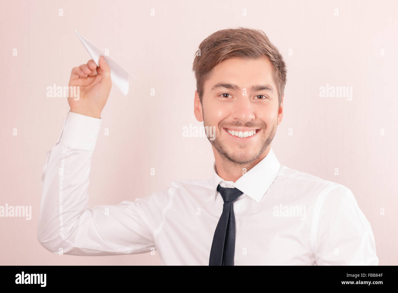 Pleasant lawyer holding paper plane Stock Photo - Alamy Pleasant lawyer holding paper plane Stock Photo - Alamy