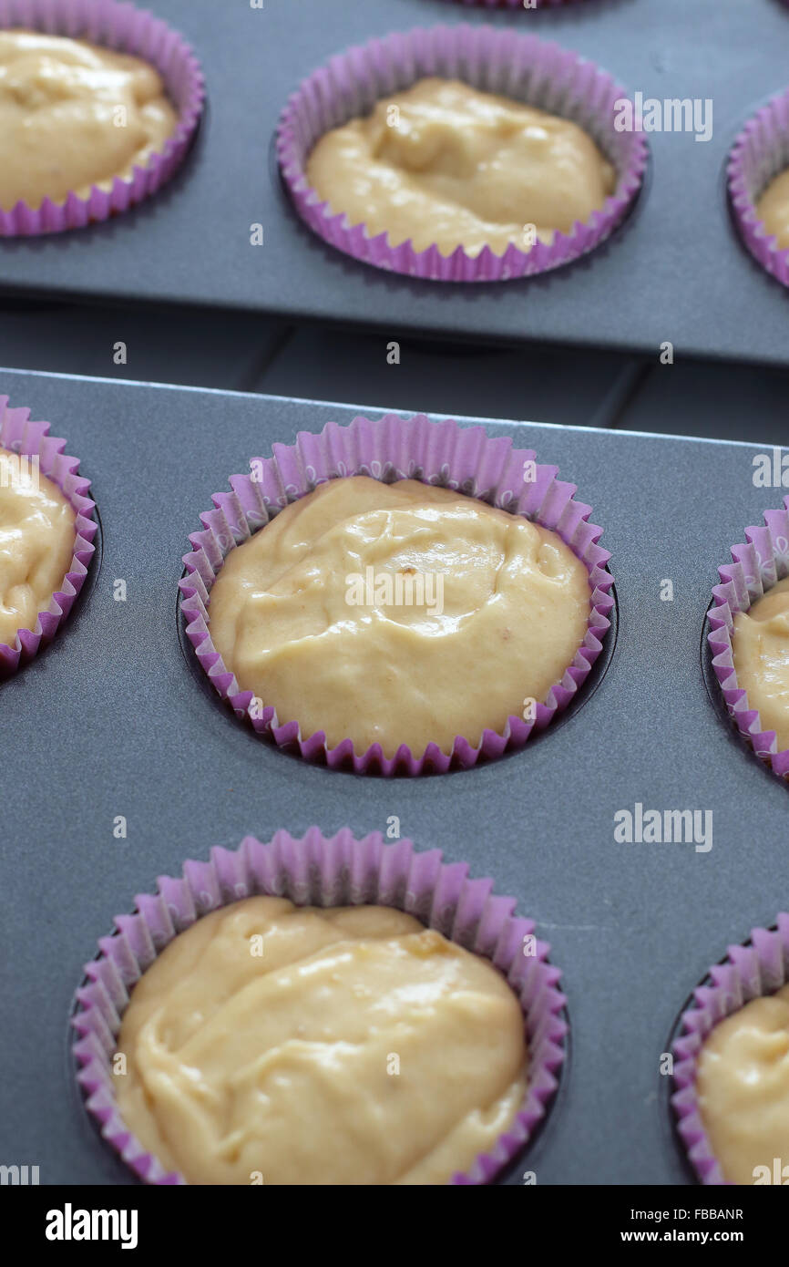 Uncooked cupcakes in cupcake tin Stock Photo - Alamy