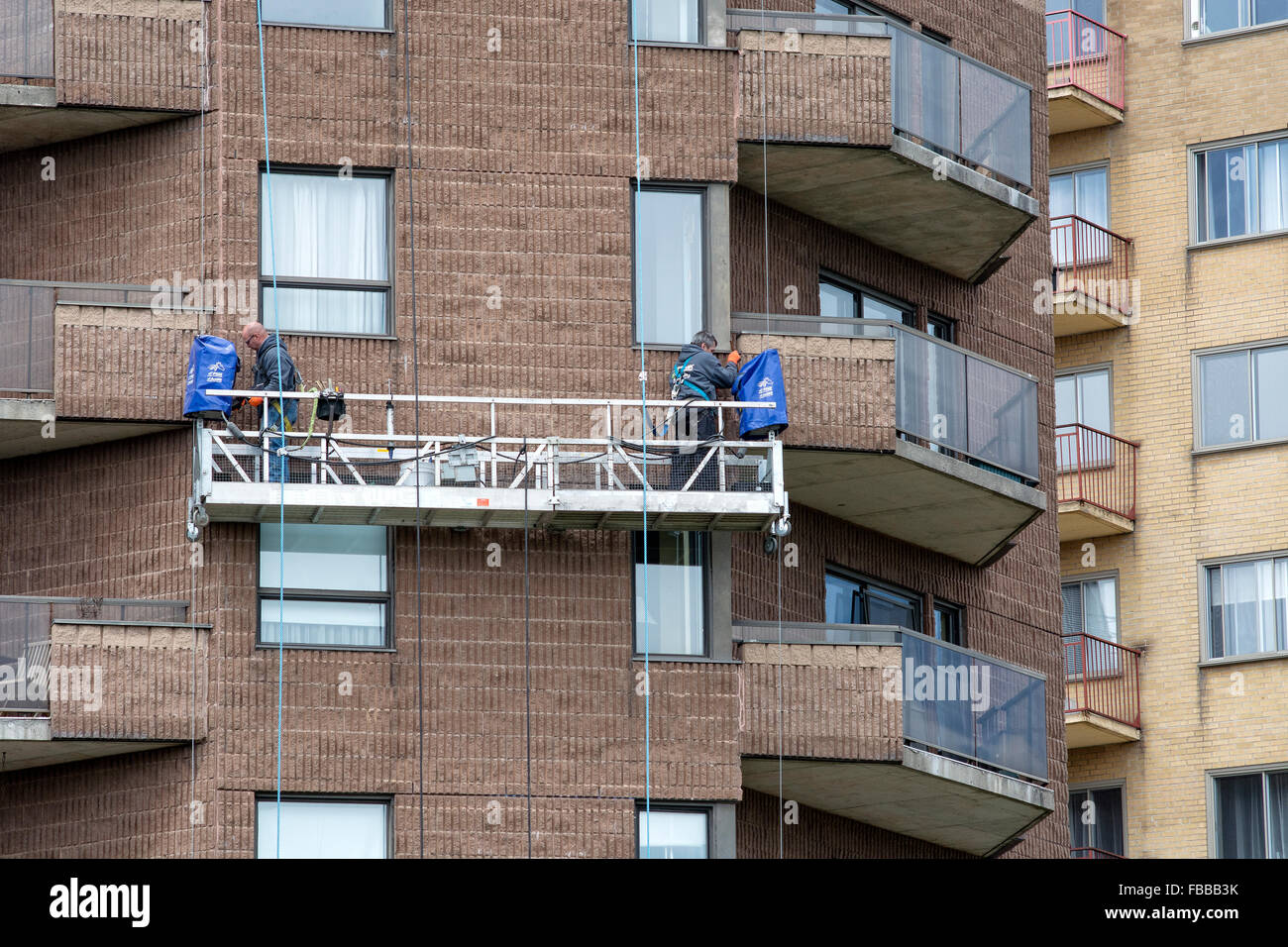 Modern building exterior cleaning hi-res stock photography and images ...