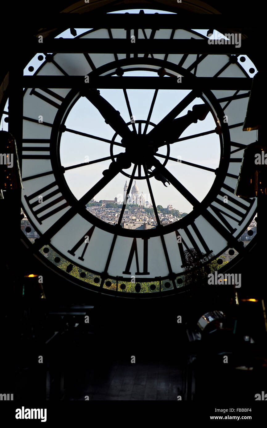 Montmartre through clock window Stock Photo - Alamy