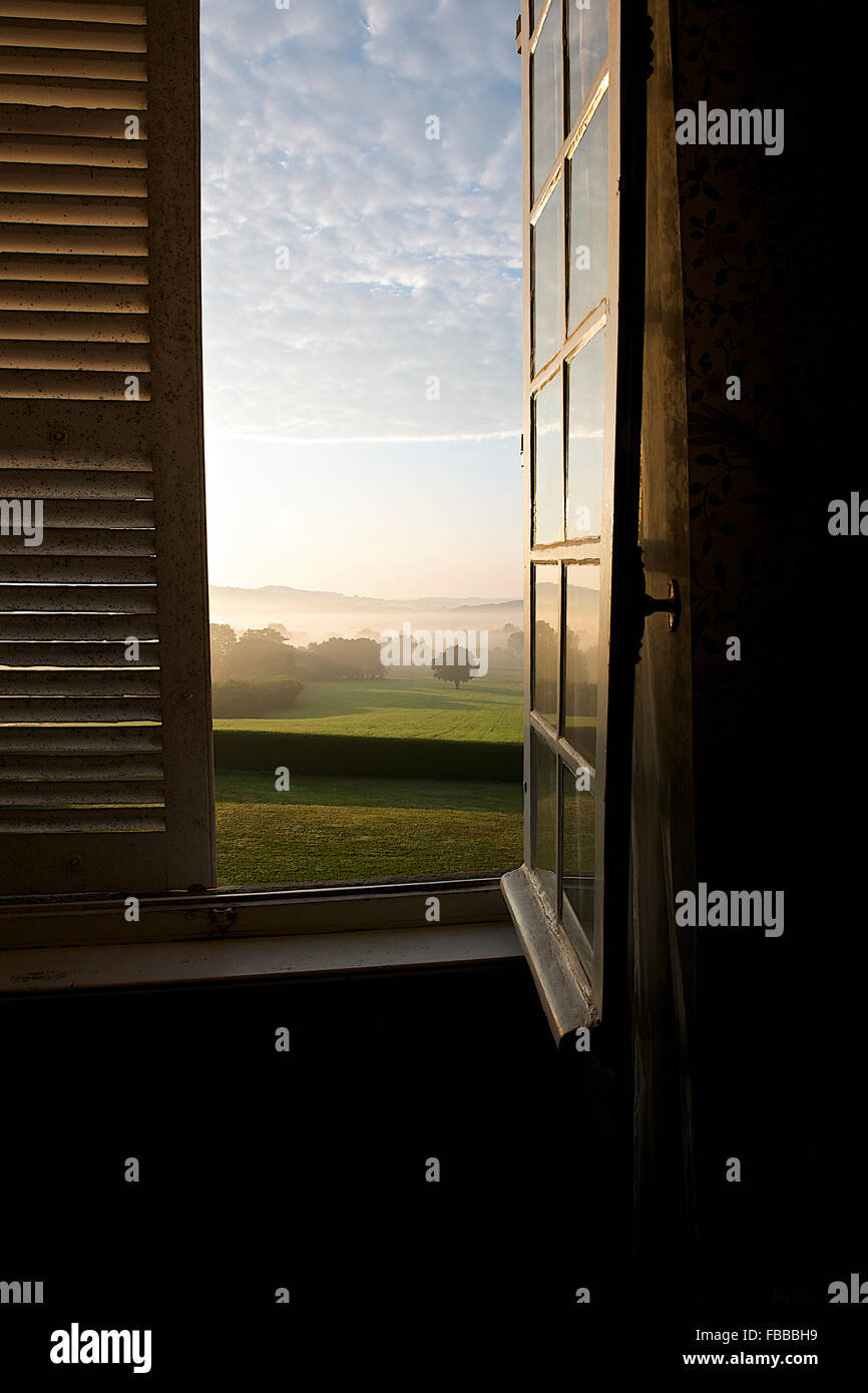 Countryside through window Stock Photo - Alamy