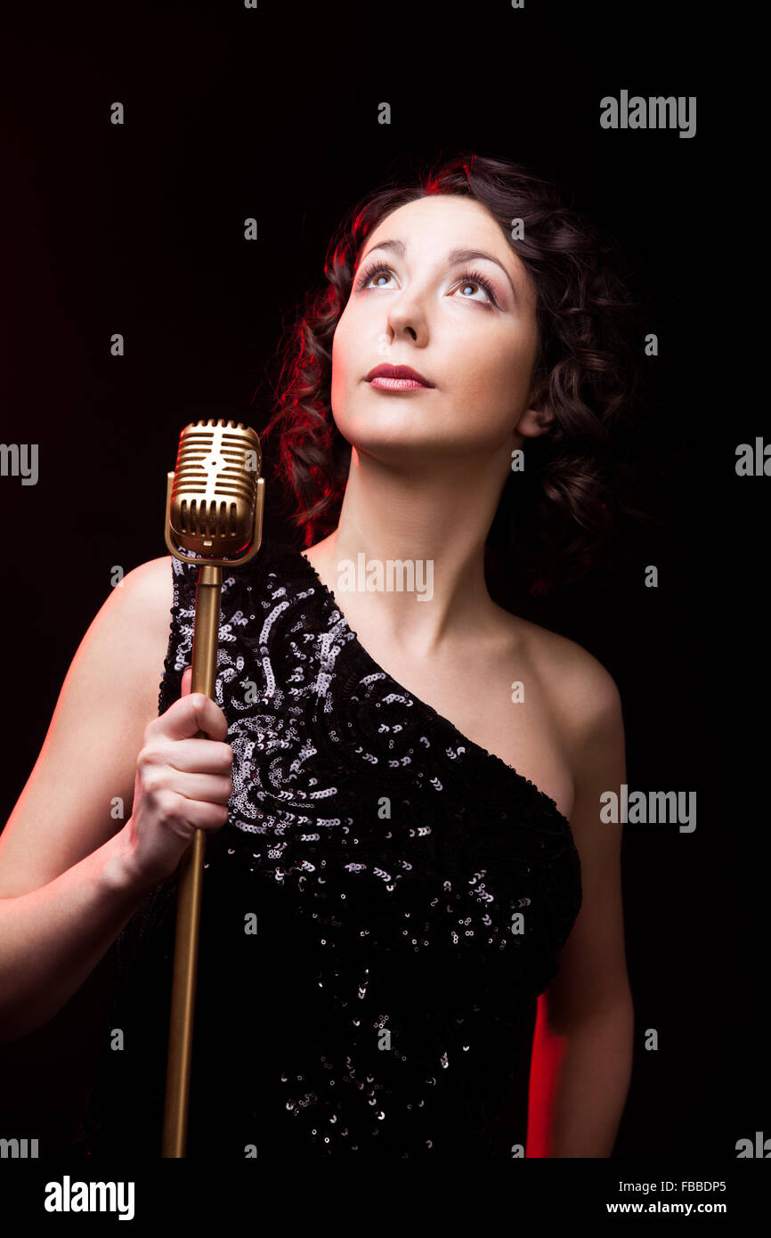 Singer in evening dress hi-res stock photography and images - Alamy