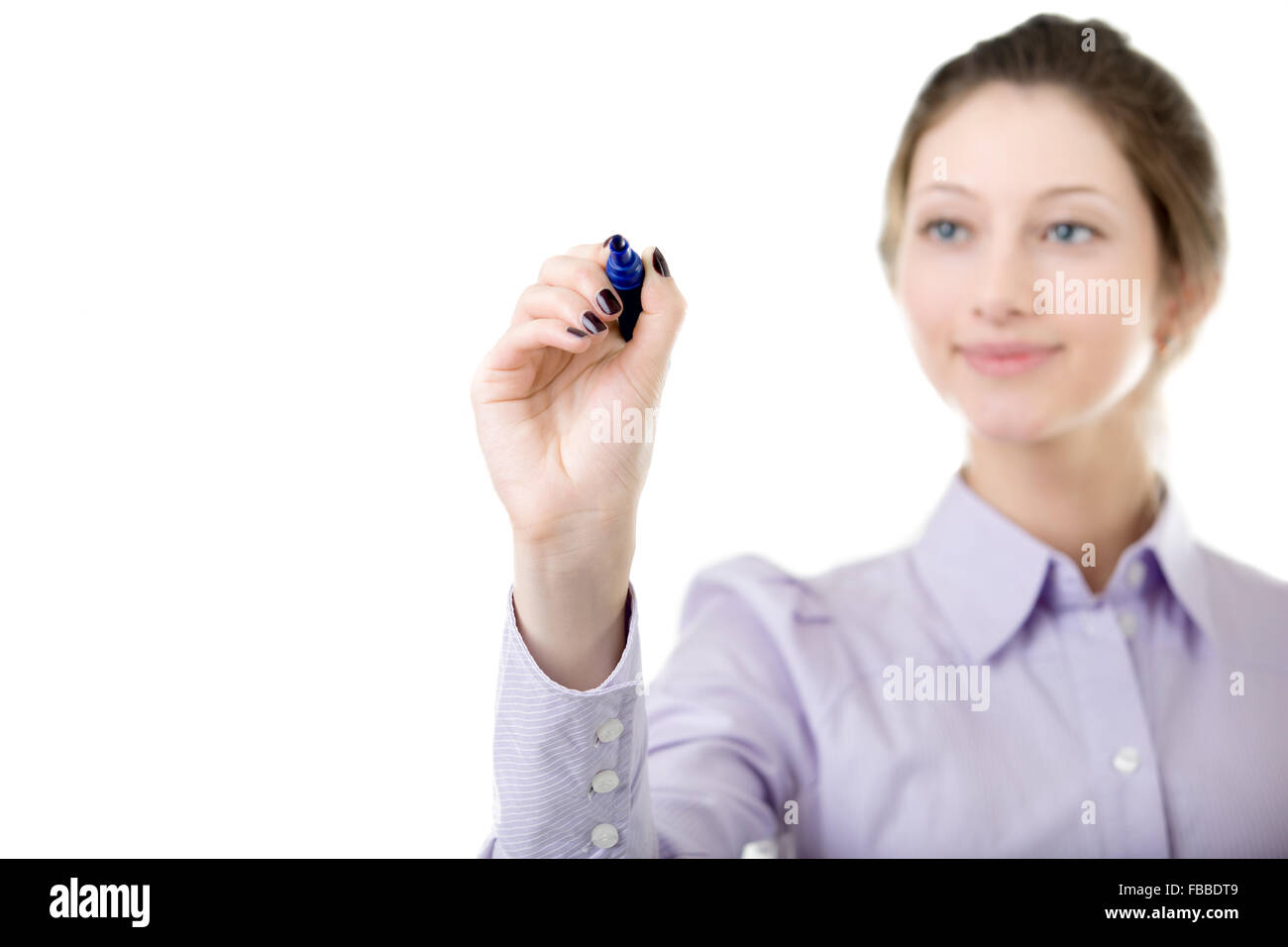 Beautiful girl writing on blank screen with marker, student or ...