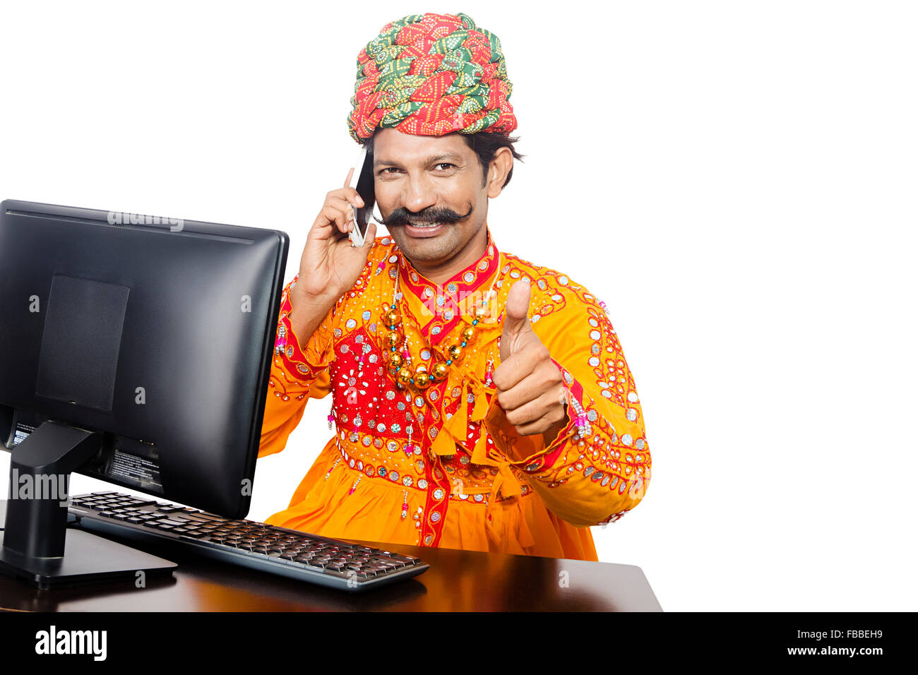 1 indian Rural Gujrati man Computer Working and Mobile Phone Multi ...