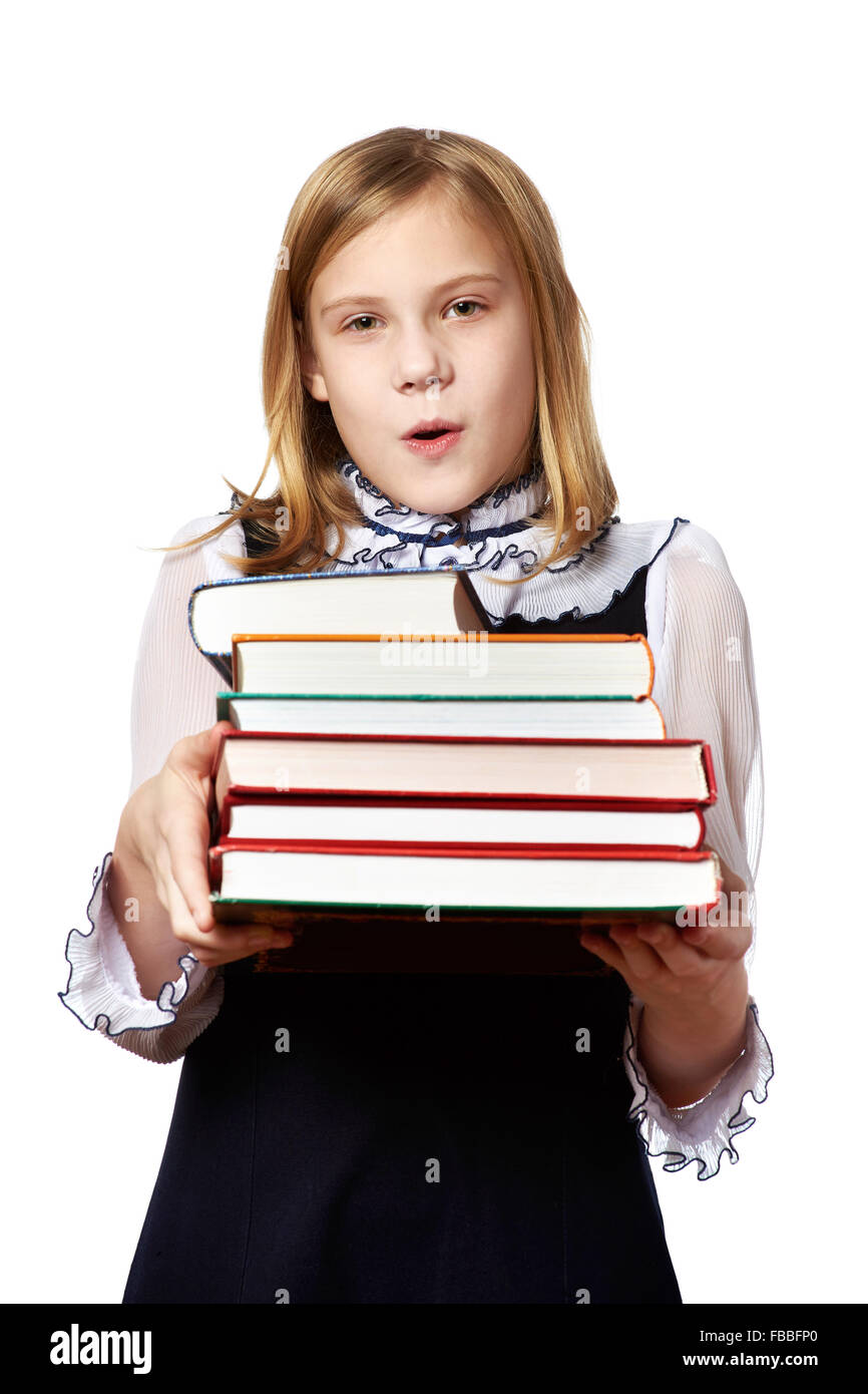 Girl schoolgirl with a heavy stack of books isolated Stock Photo - Alamy