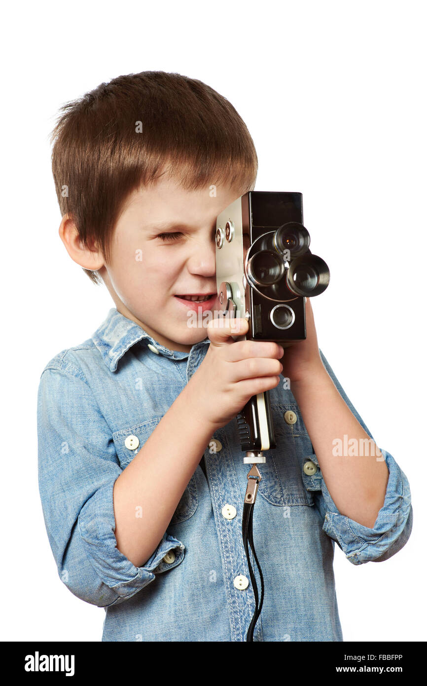 Little boy cameraman filming with retro camera isolated Stock Photo - Alamy