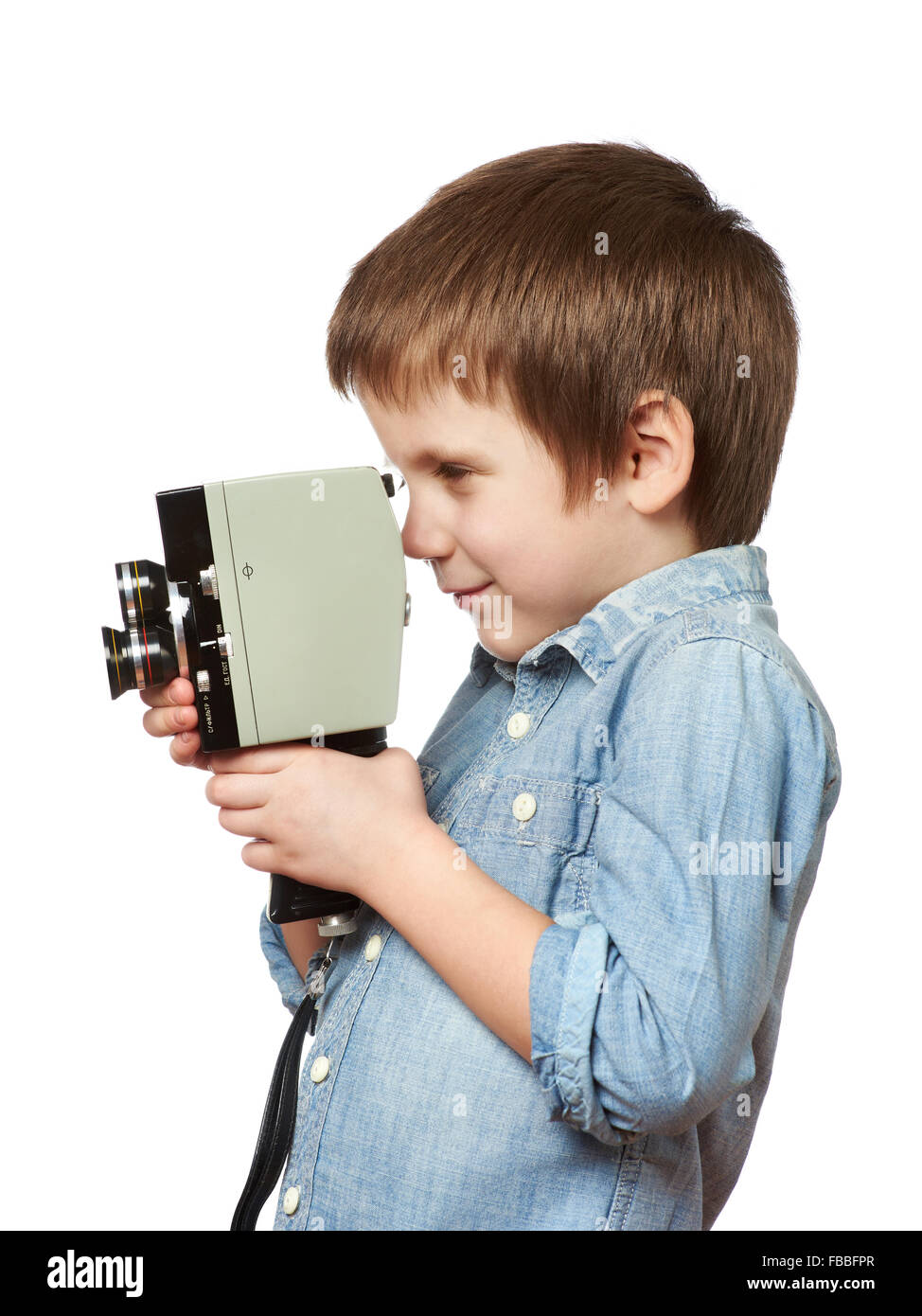 Little boy cameraman filming with retro camera isolated Stock Photo - Alamy