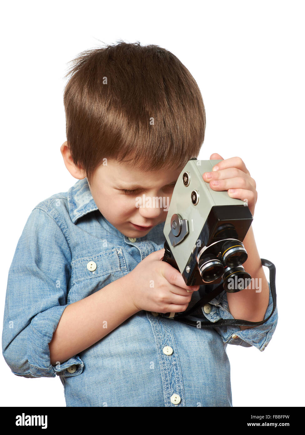 Little boy cameraman filming with retro camera isolated Stock Photo - Alamy